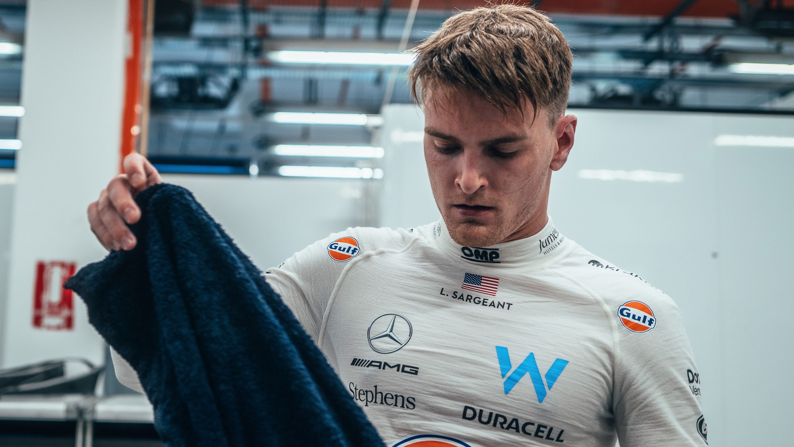 WATCH: Climbing out of the FW45 on a sweltering night in Singapore ...