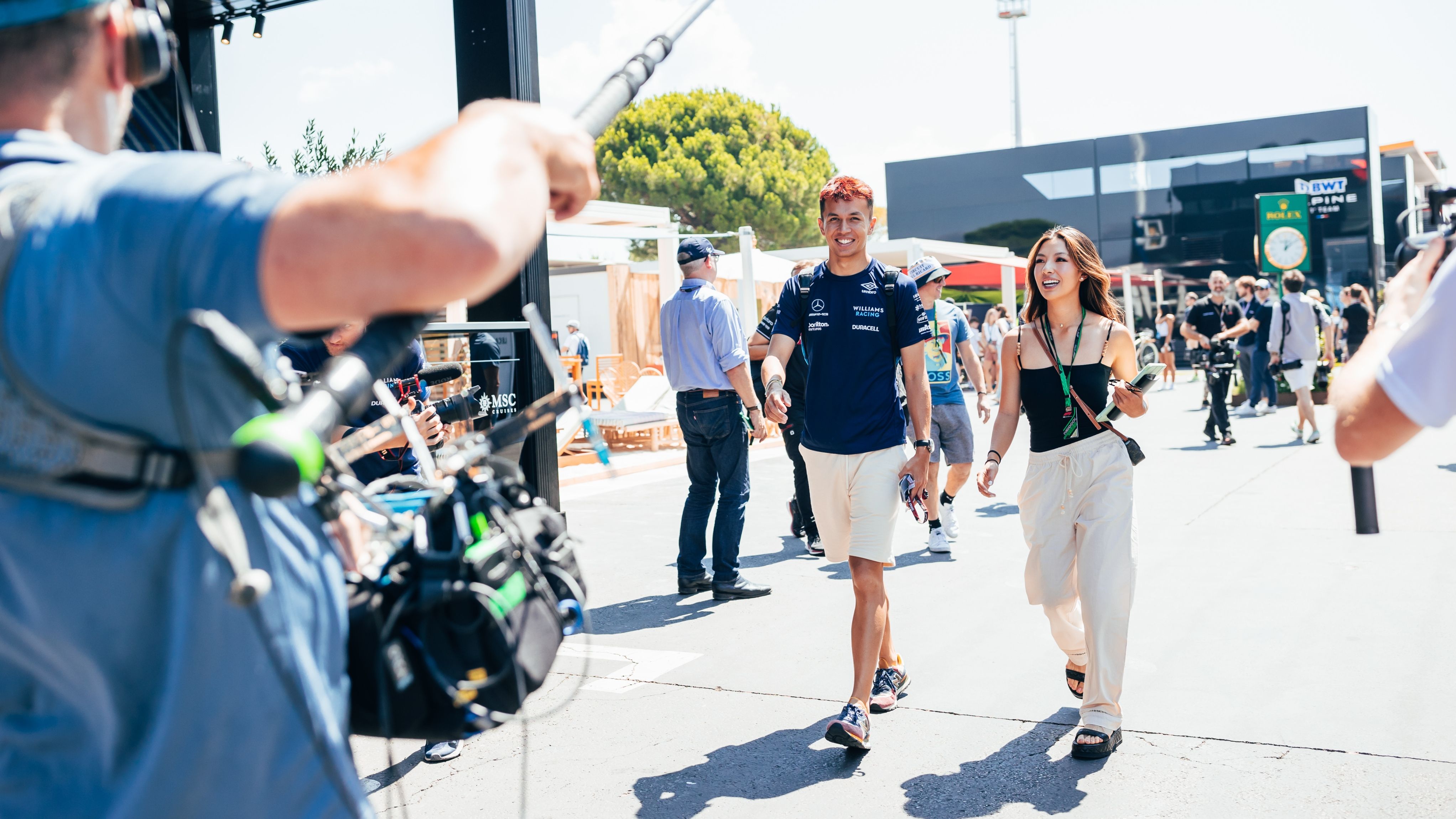 Alex Albon and his partner, professional golfer Lily He, arrive ahead ...